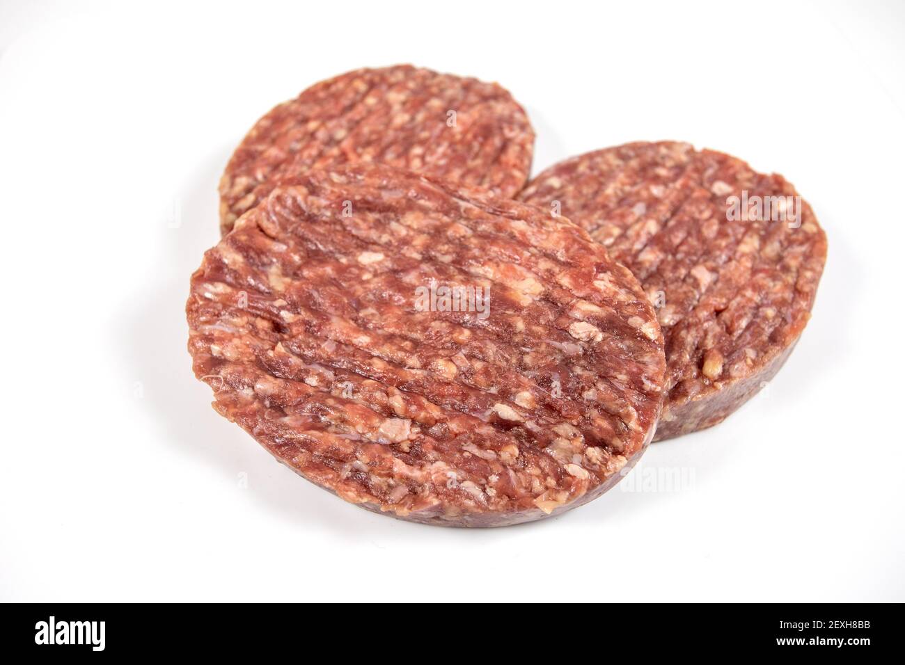 raw ground steak on white background Stock Photo - Alamy