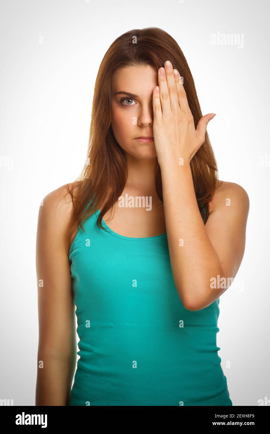Woman brunette girl covered her face half a hand Stock Photo - Alamy