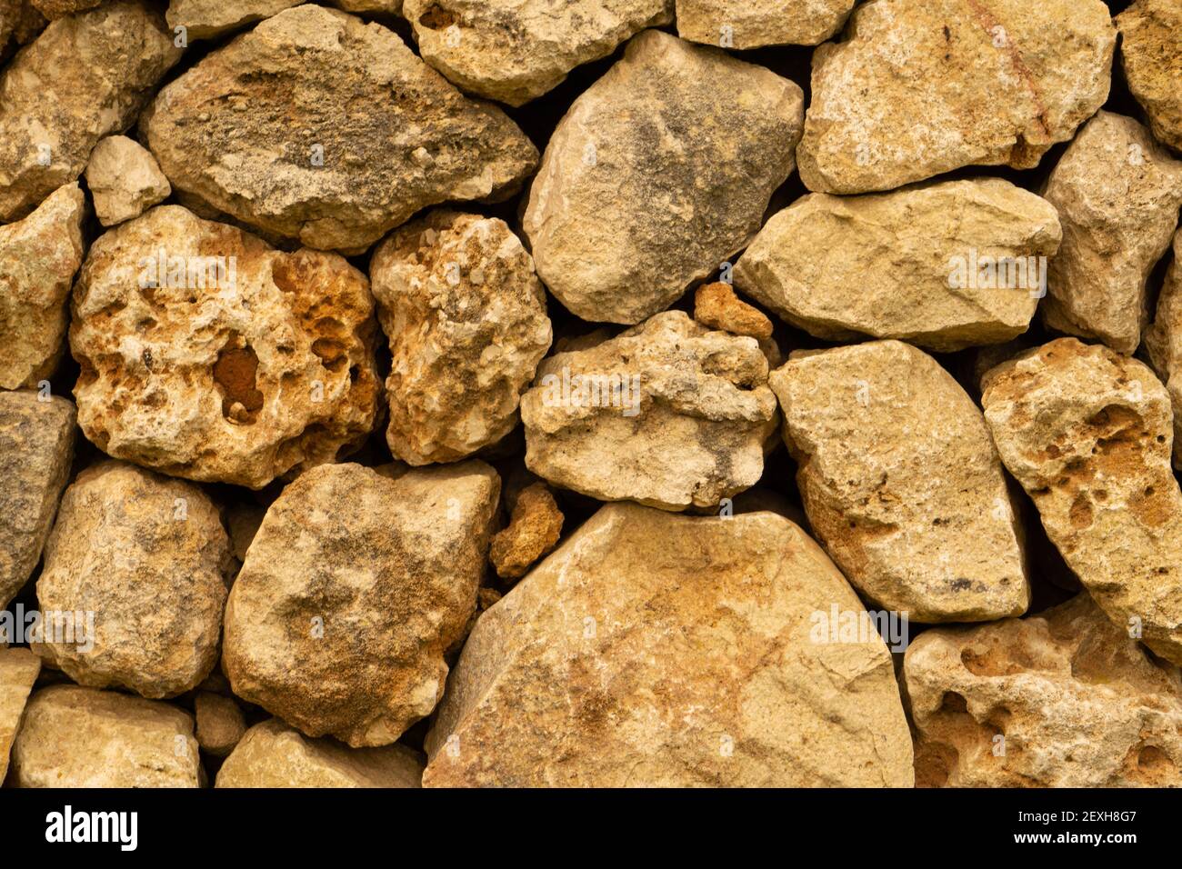 An old stone wall texture background Stock Photo - Alamy