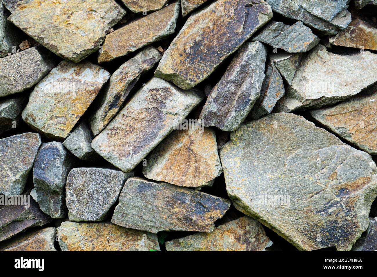 An old flagstone wall texture background Stock Photo - Alamy