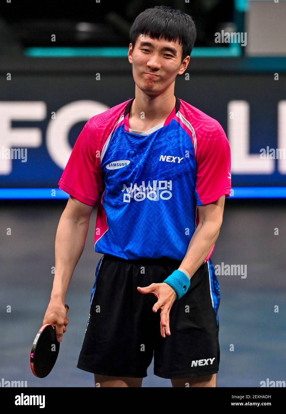 Doha. 4th Mar, 2021. Lee Sangsu of South Korea reacts during the men's singles round of 16 match ...