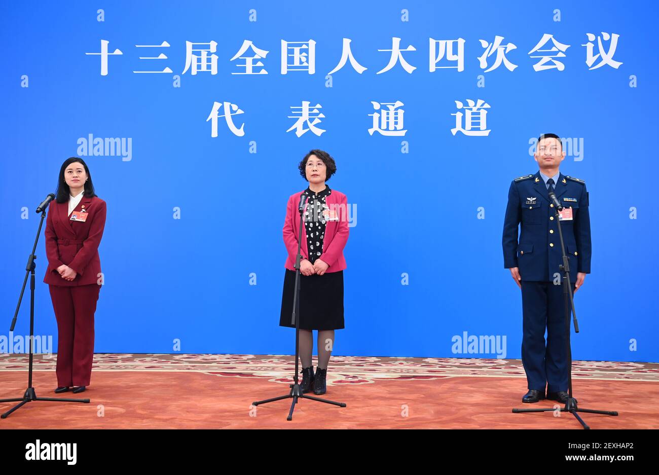 Beijing, China. 5th Mar, 2021. Yuan Jing, Guo Yanling, Yu Hailong (L to ...
