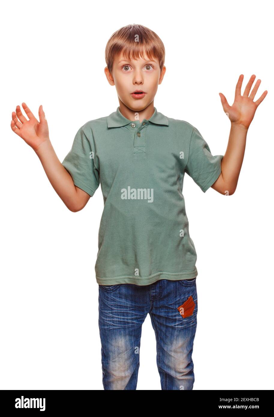 Teenager boy raised his hands up baby boy surprised isolated Stock ...