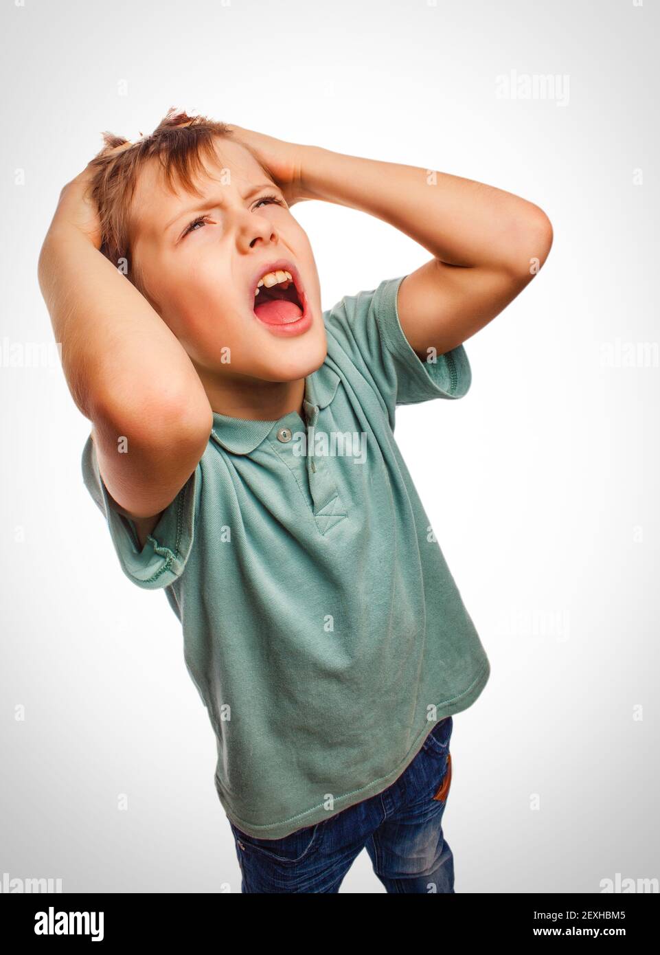 Child boy upset angry shout produces evil face portrait isolated Stock ...