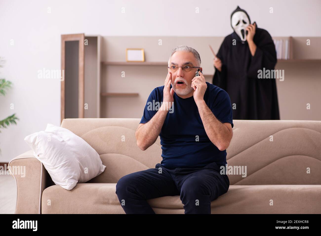 Devil coming to old dying man Stock Photo - Alamy