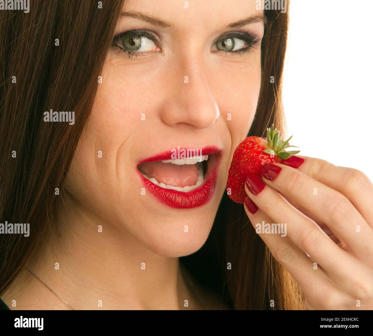Woman eating berry tree hi-res stock photography and images - Alamy