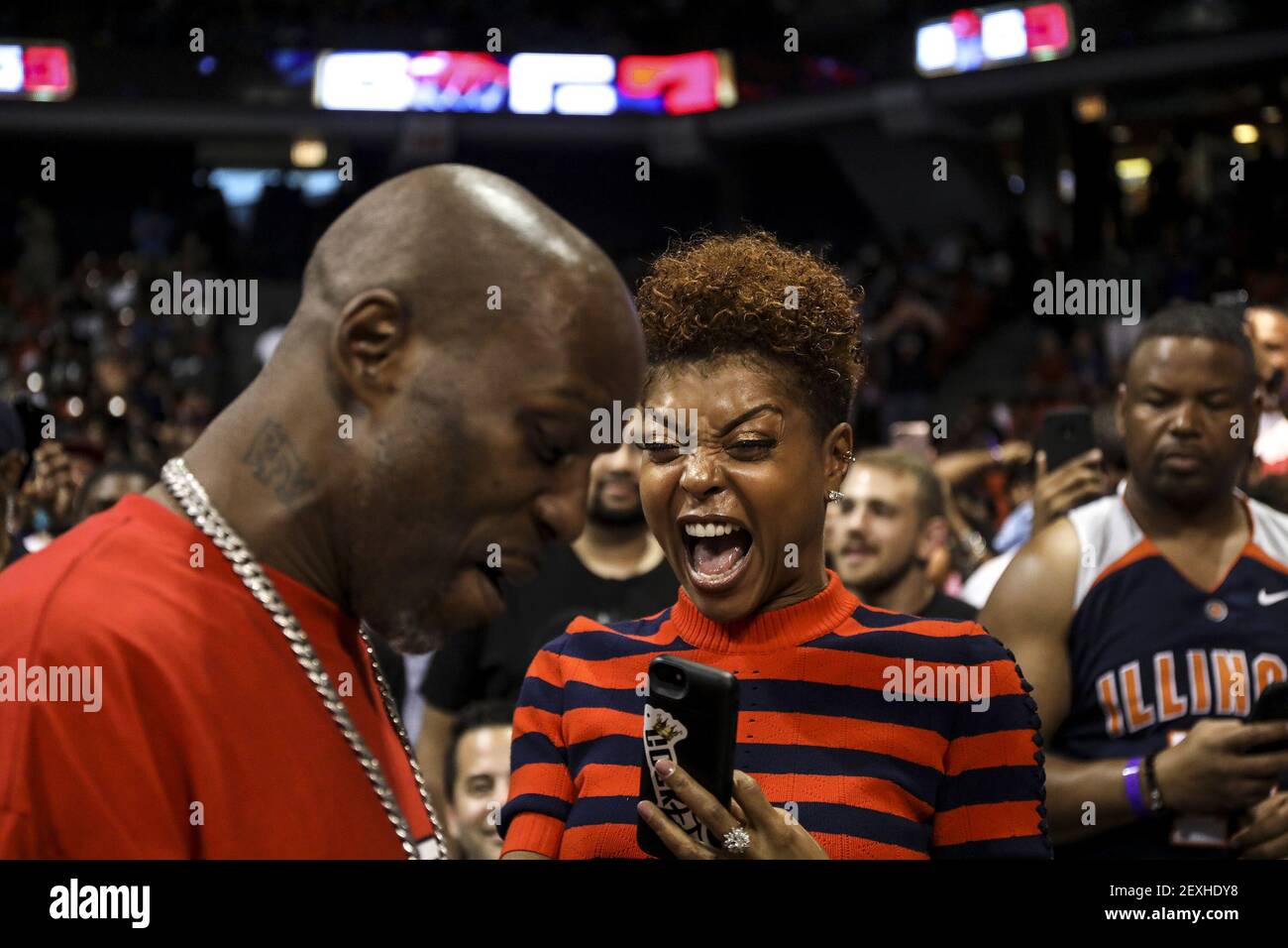 A woman reacts to seeing rapper DMX before game three of the Big3 3-on ...
