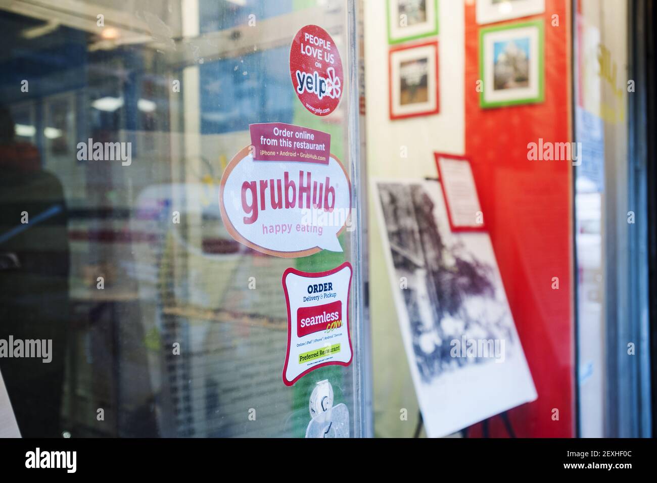 Stickers for Seamless and GrubHub internet food delivery services are ...