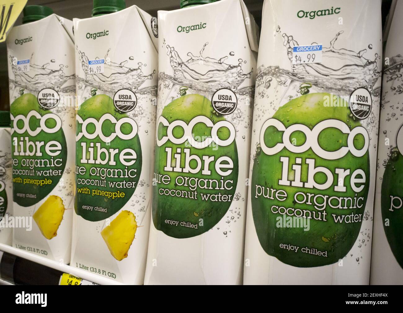 Containers of New Age Beverages' Coco Libre brand coconut water are ...