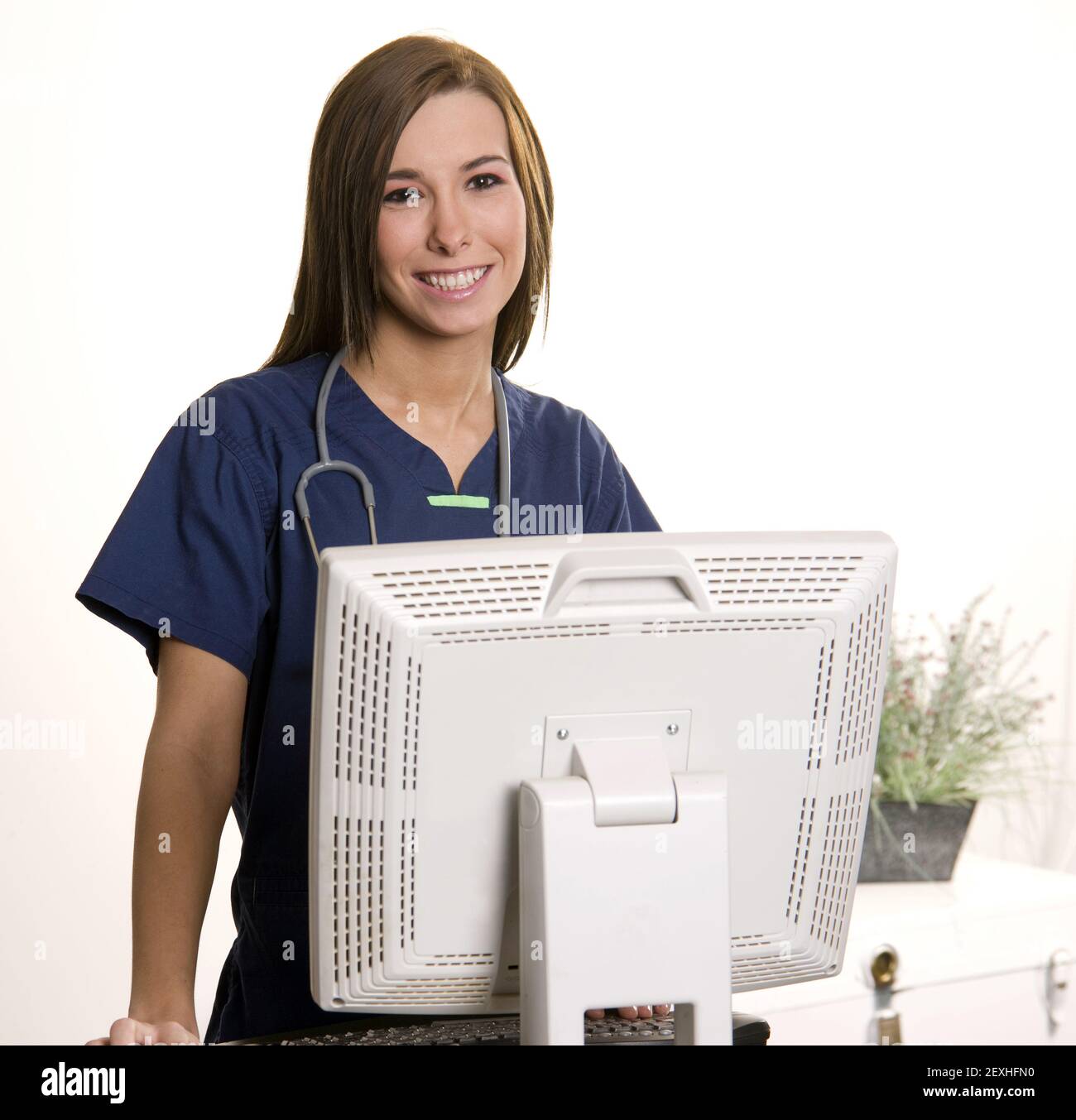 Doctor nurse looking computer monitor hi-res stock photography and ...