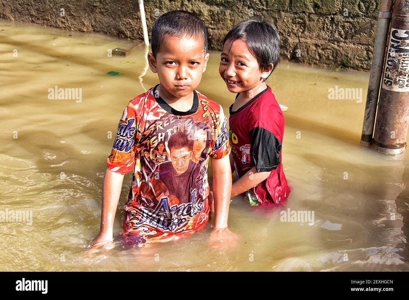 Children are playing when the floods that inundate the Dayeuhkolot area ...