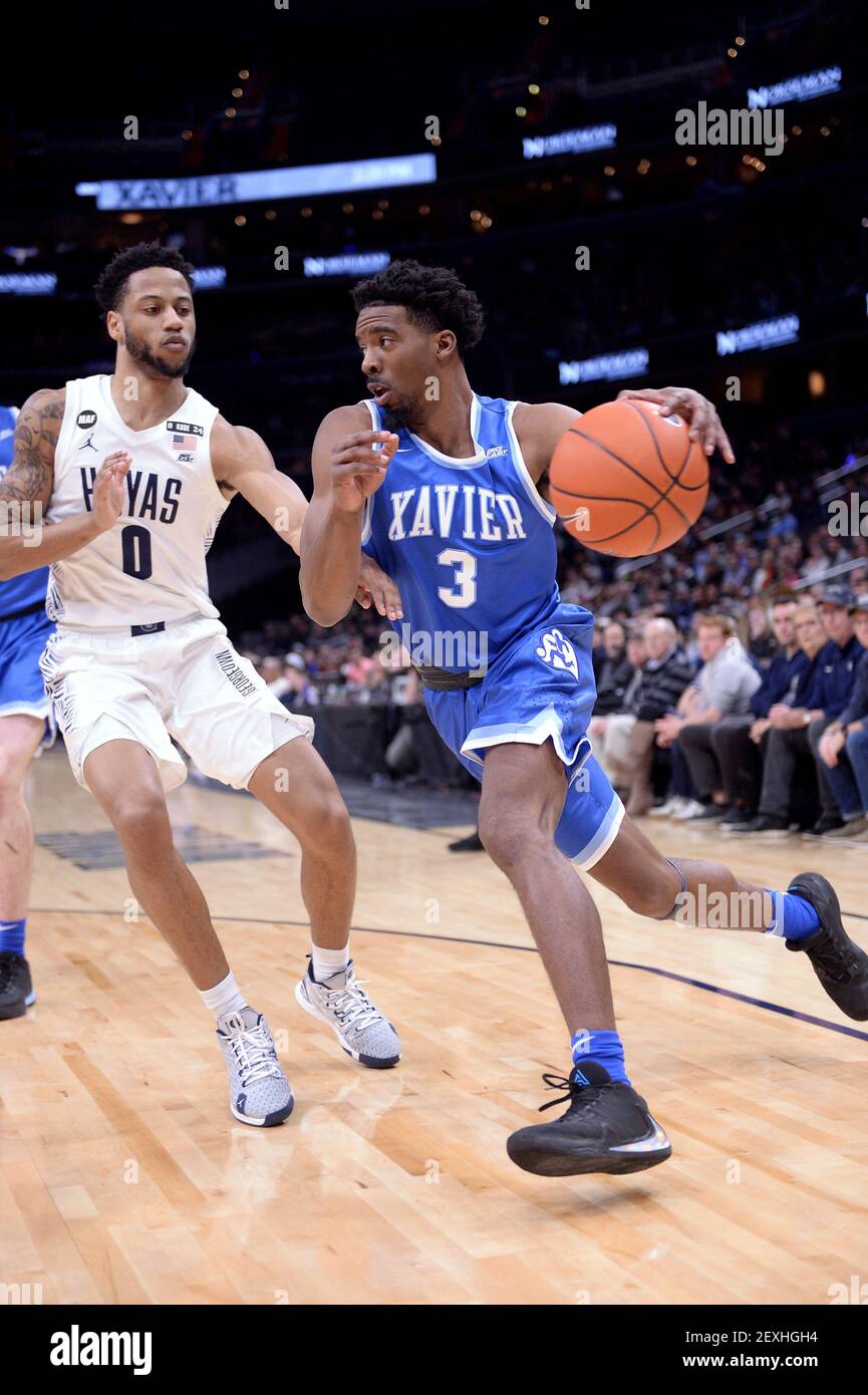 Xavier guard Quentin Goodin (3) drives against Georgetown guard Jahvon ...