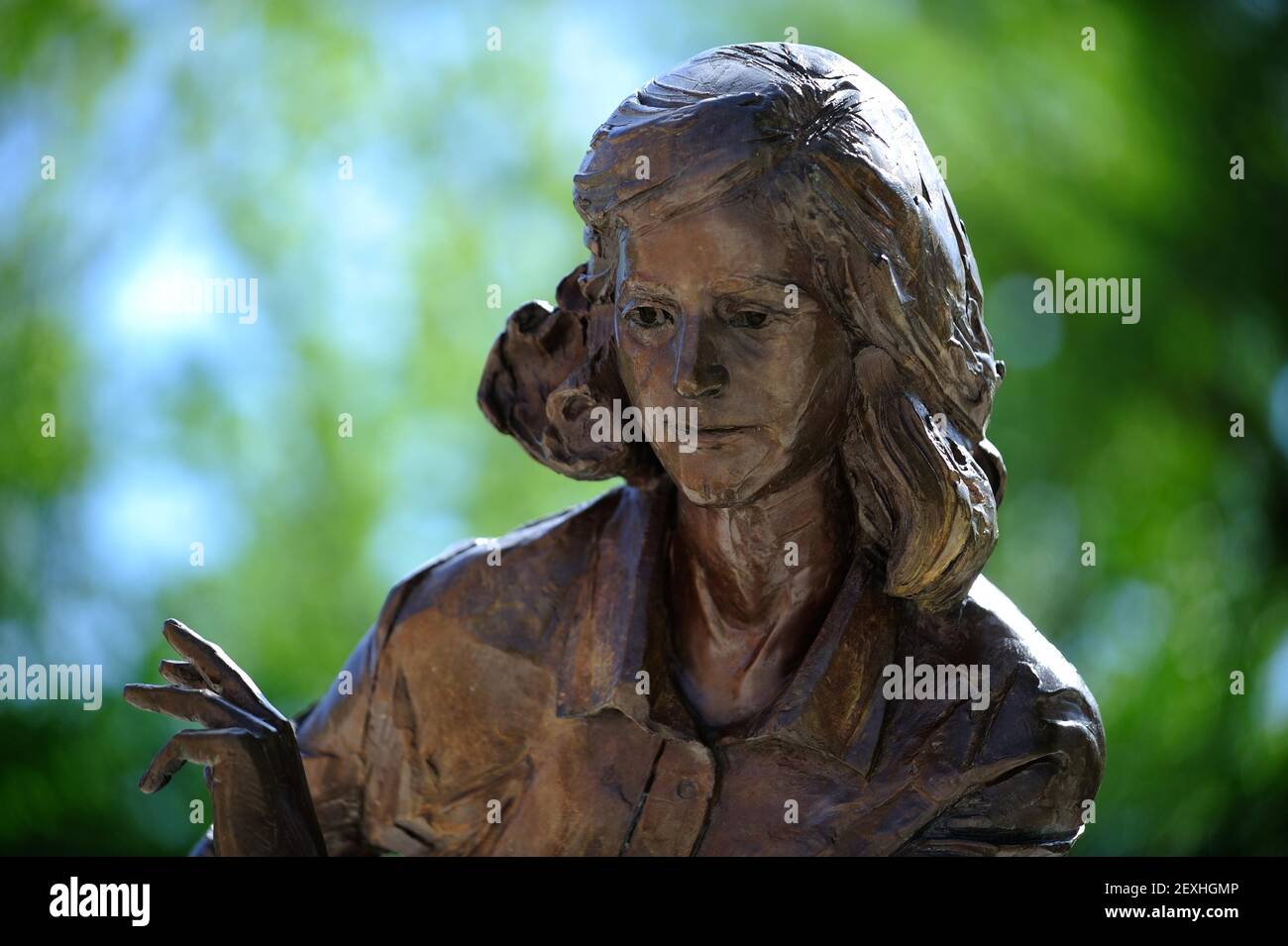 A life-size bronze statue of Anne Frank by sculptor Greg Stone made to ...
