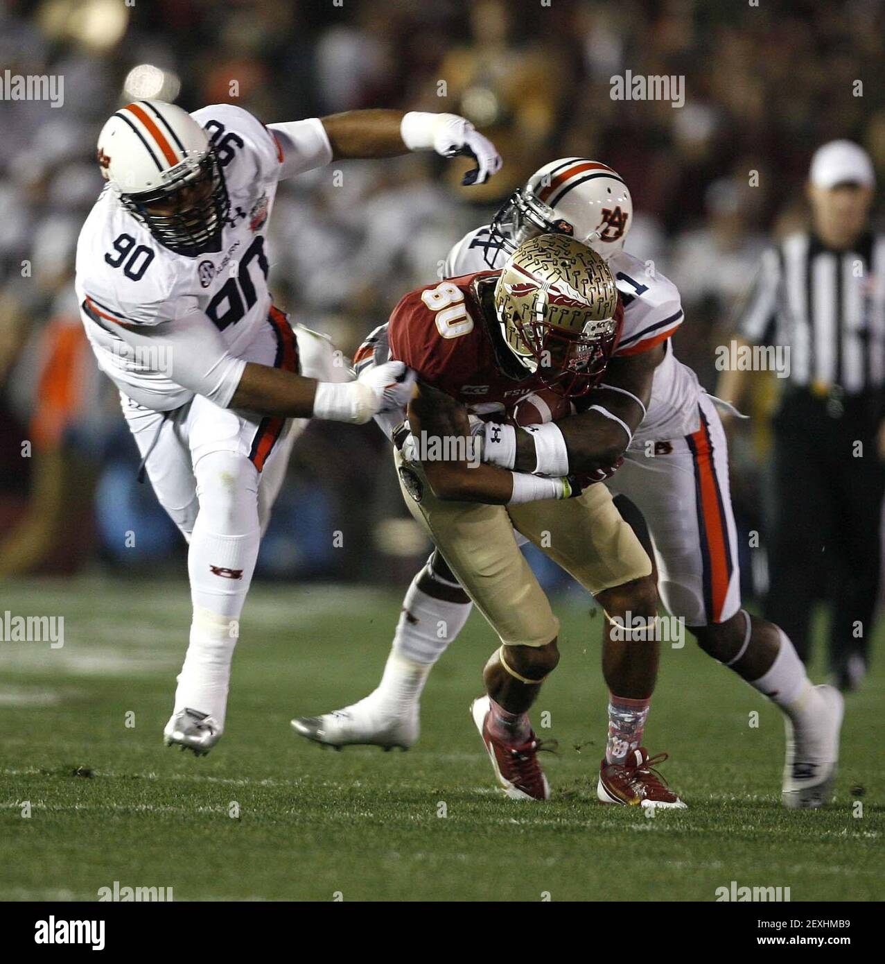 Florida State Seminoles' Rashad Greene gets wrapped up by Auburn Tigers ...
