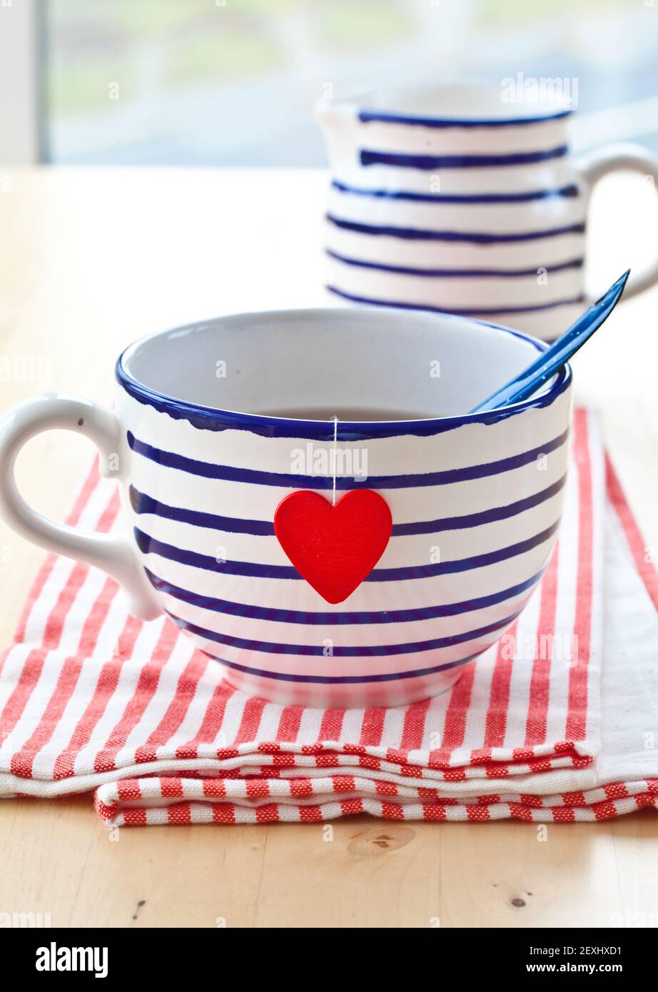 Large cup with tea Stock Photo - Alamy