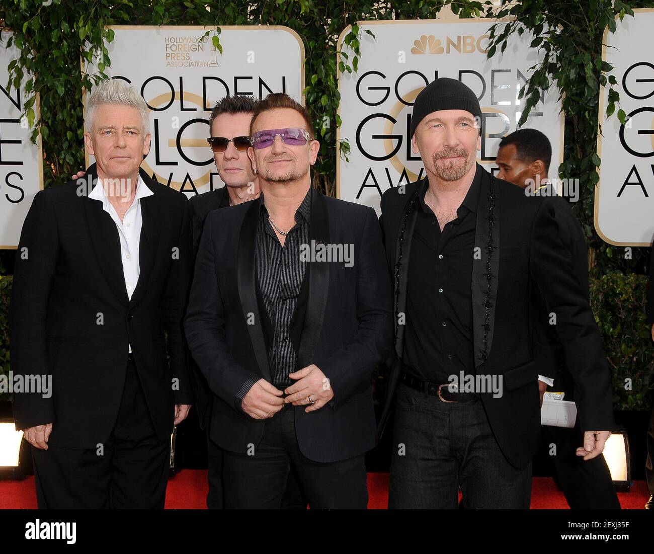 Members of the band U2 arrive at the 71st Annual Golden Globe Awards ...