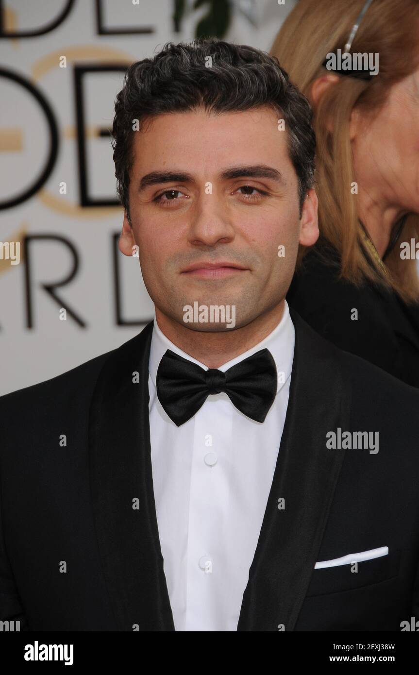 Actor Oscar Isaac arrives at the 71st Annual Golden Globe Awards held ...