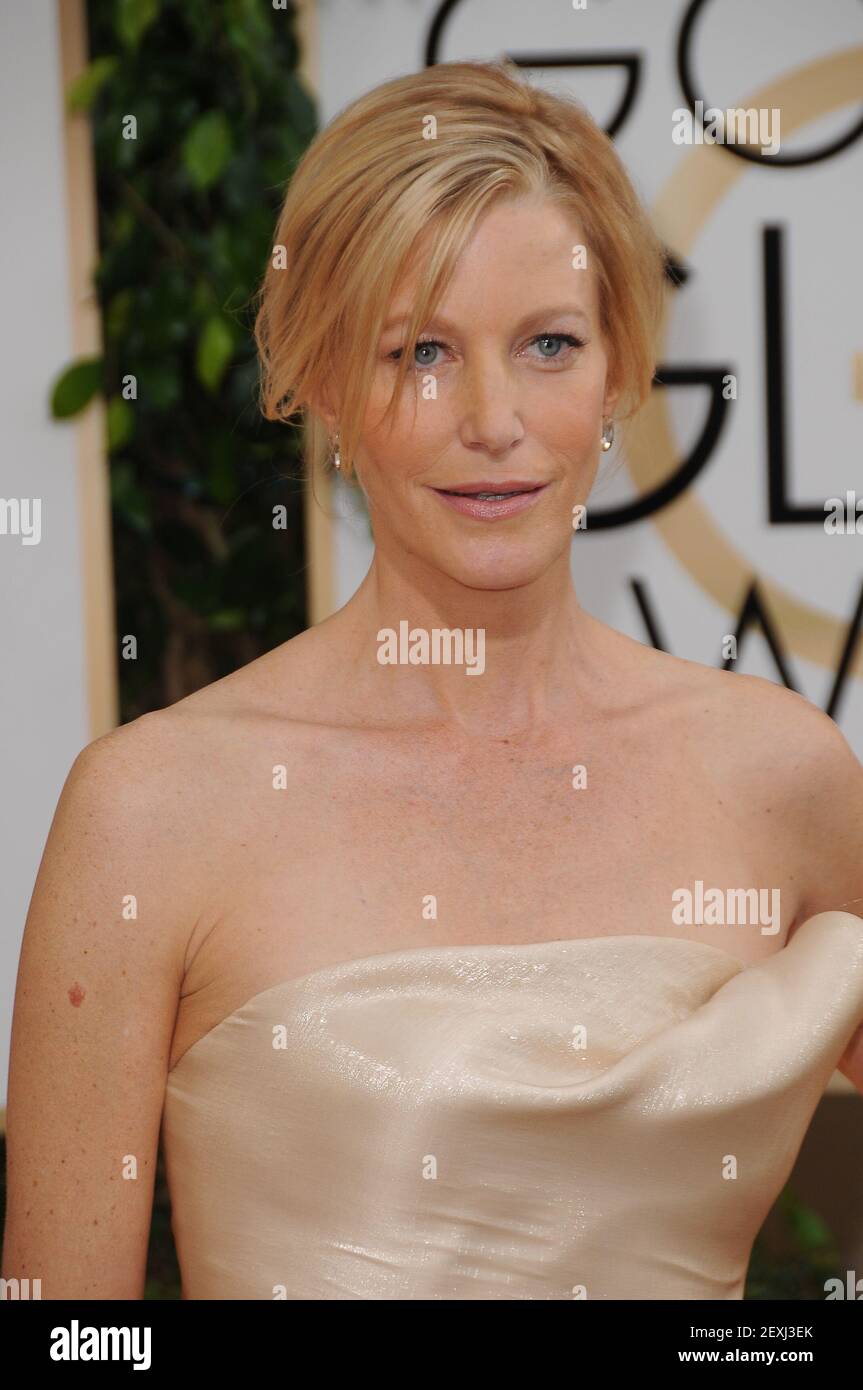 Actress Anna Gunn arrives at the 71st Annual Golden Globe Awards held ...