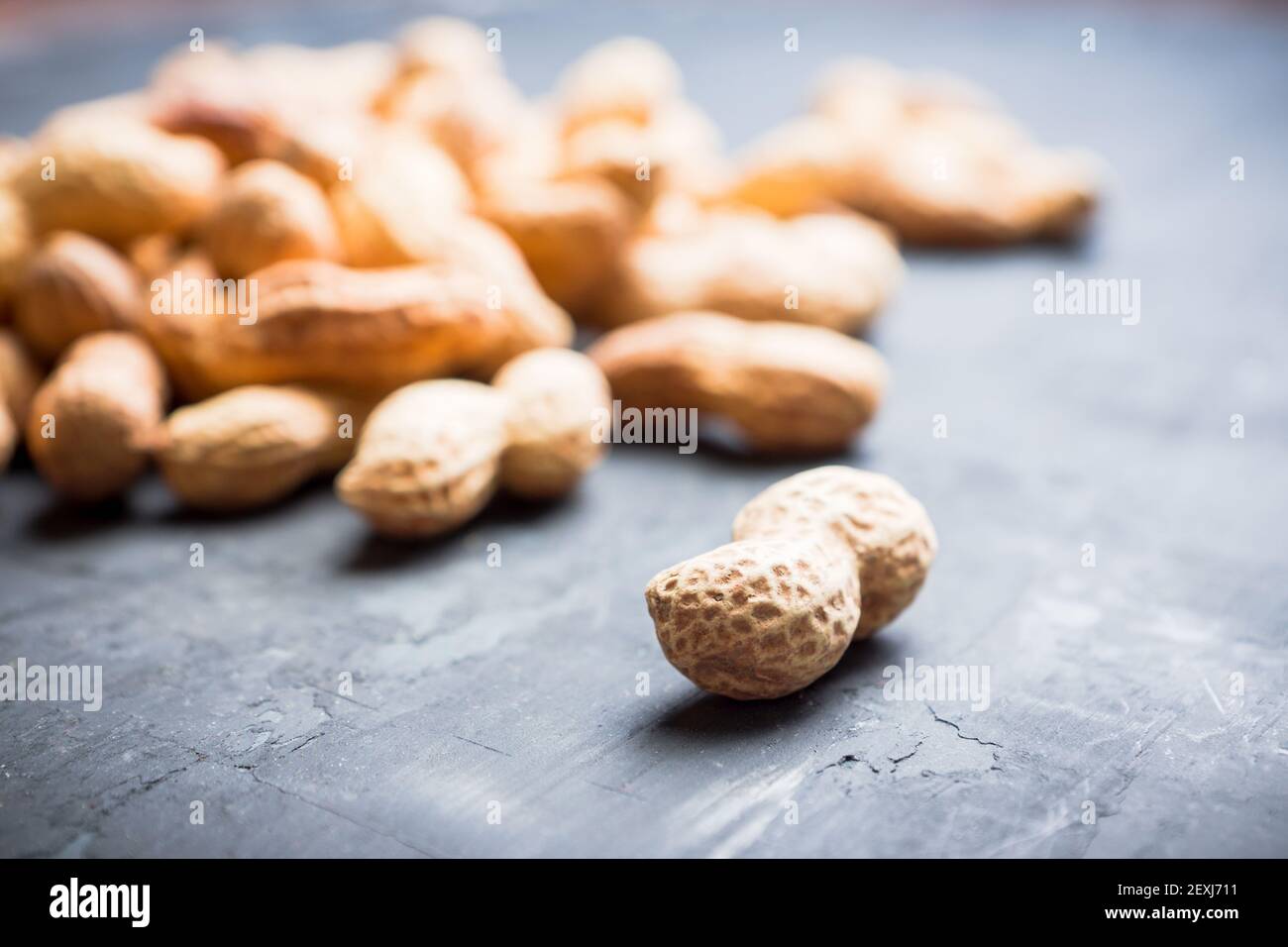 Peanuts in shell. Selecttive focus. Shallow depth of field Stock Photo ...