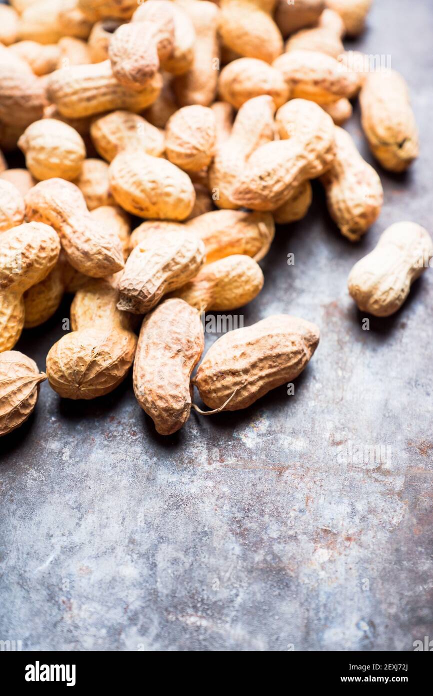 Peanuts in shell. Selecttive focus. Shallow depth of field Stock Photo ...