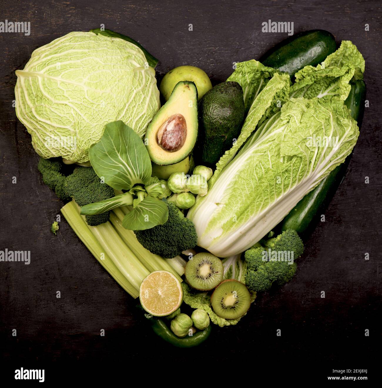 Mix of cabbages on white background: white cabbage, red cabbage, Savoy ...