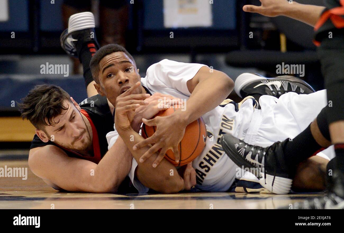 George Washington guard Kethan Savage (11) and Georgia forward Nemanja ...