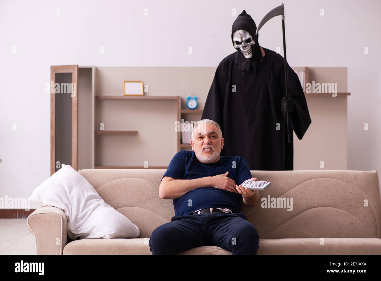 Devil coming to old dying man Stock Photo - Alamy