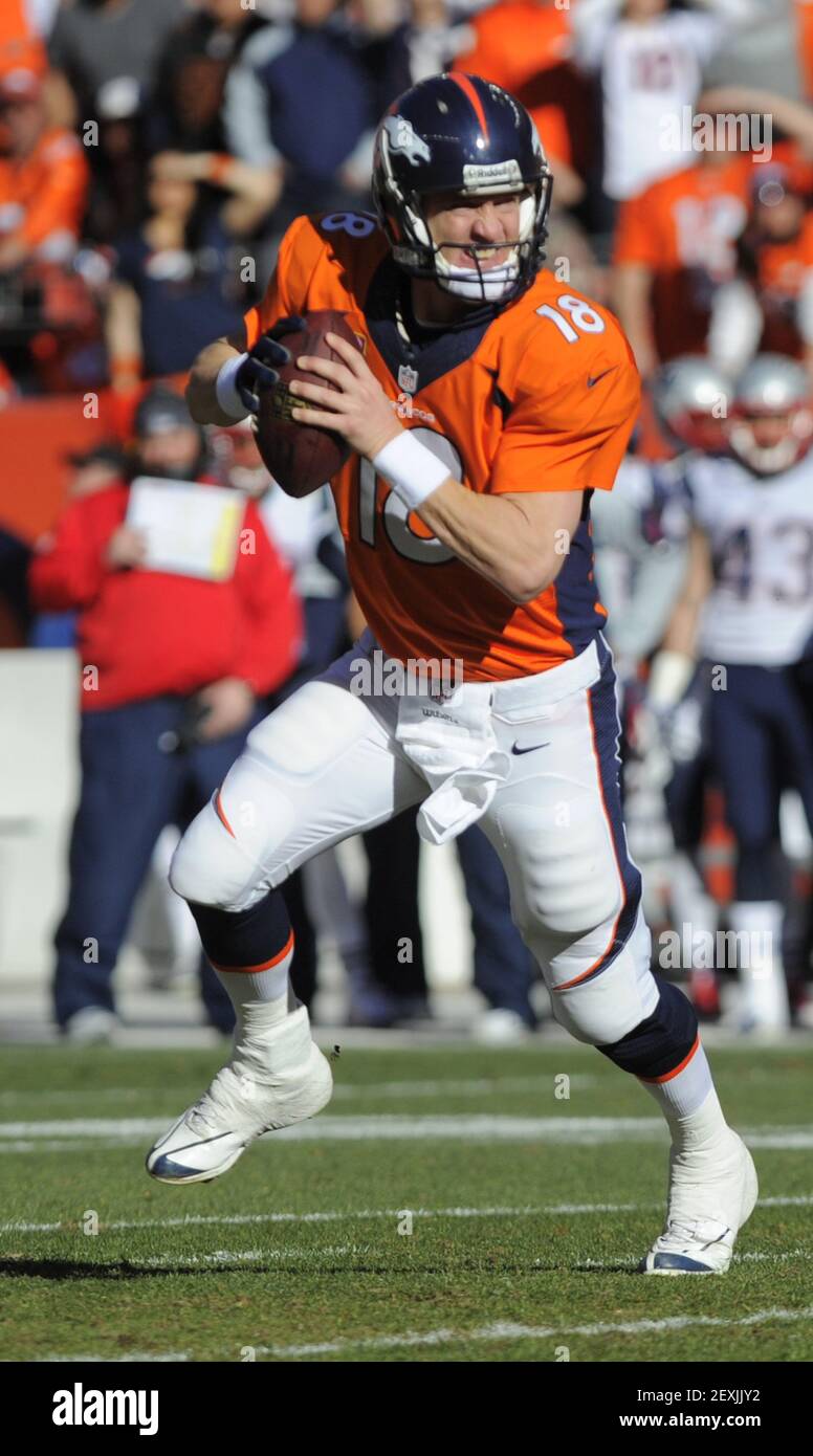 Denver Broncos quarterback Peyton Manning readies to unleash a ...