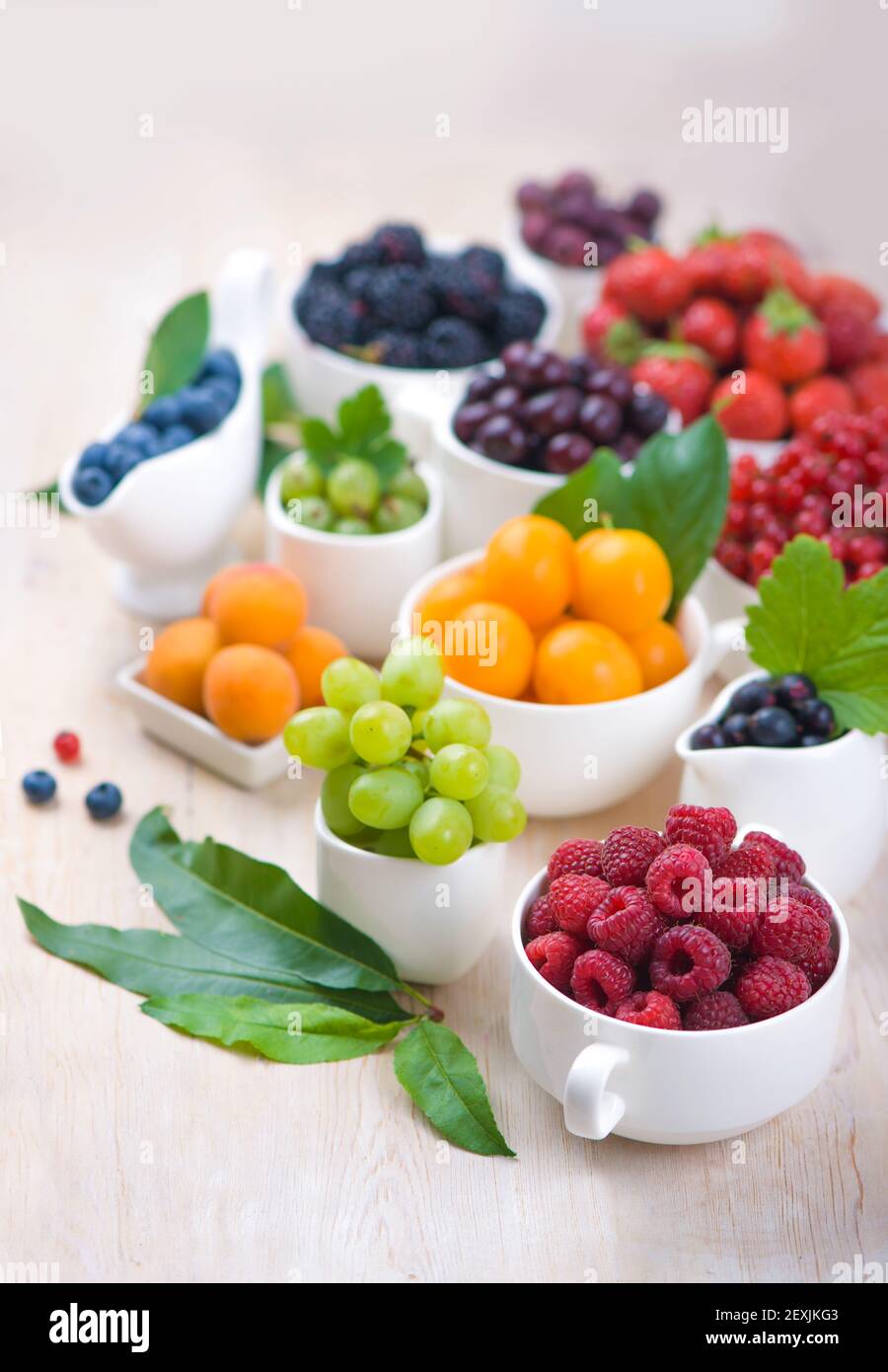 berry mix isolated on a white background Stock Photo - Alamy