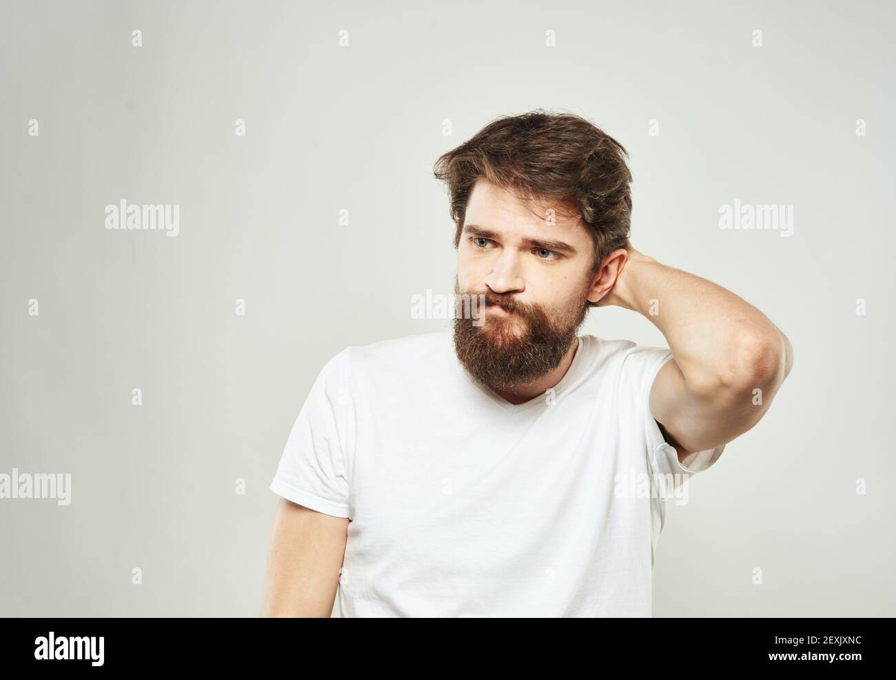 The guy gestures with his hands a puzzled look of emotion of ...