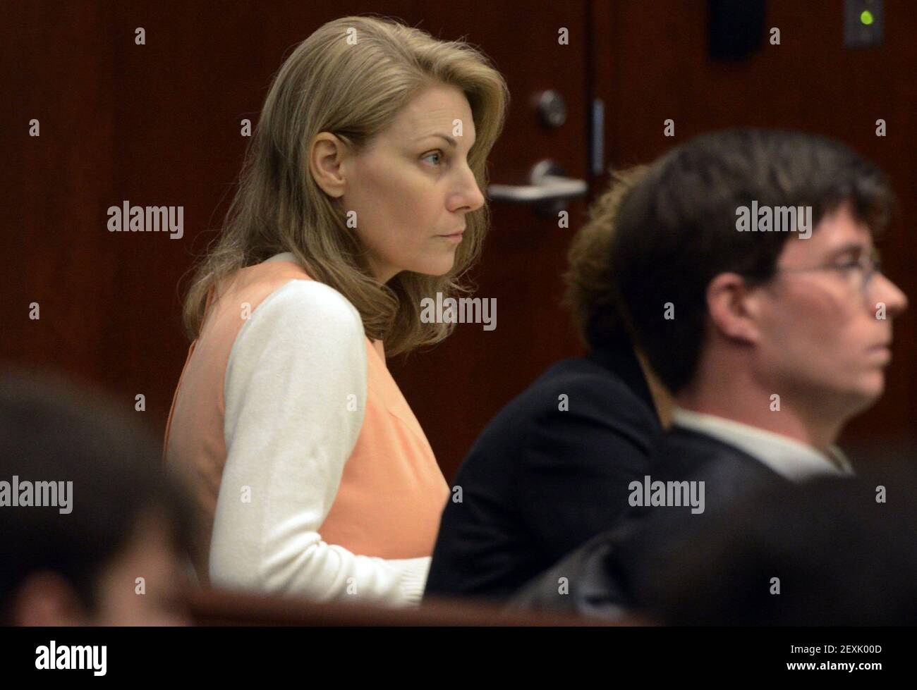 Defendant Amanda Hayes, center, listens to opening statements in her ...