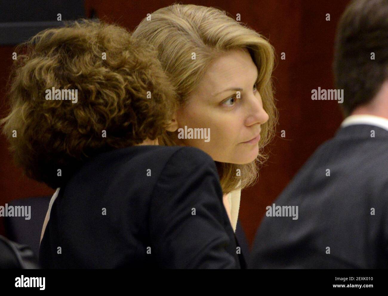 Defendant Amanda Hayes, center, listens to her lawyer Rosemary Godwin ...