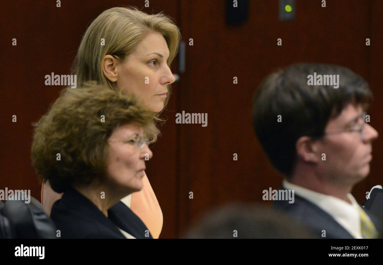 Defendant Amanda Hayes, center, listens to opening statements in her ...
