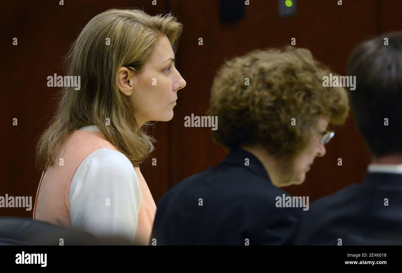 Defendant Amanda Hayes, center, listens to opening statements in her ...