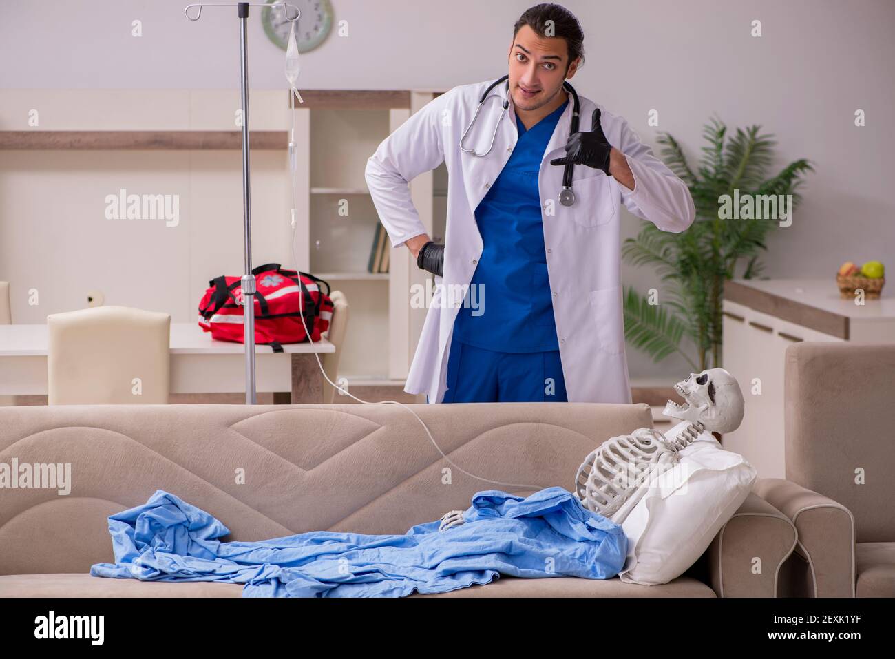 Male paramedic visiting skeleton patient Stock Photo - Alamy