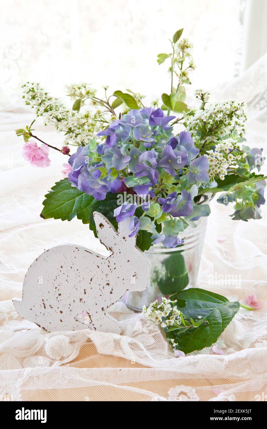 Colorful bouquet of flowers in vintage zinc bucket Stock Photo - Alamy