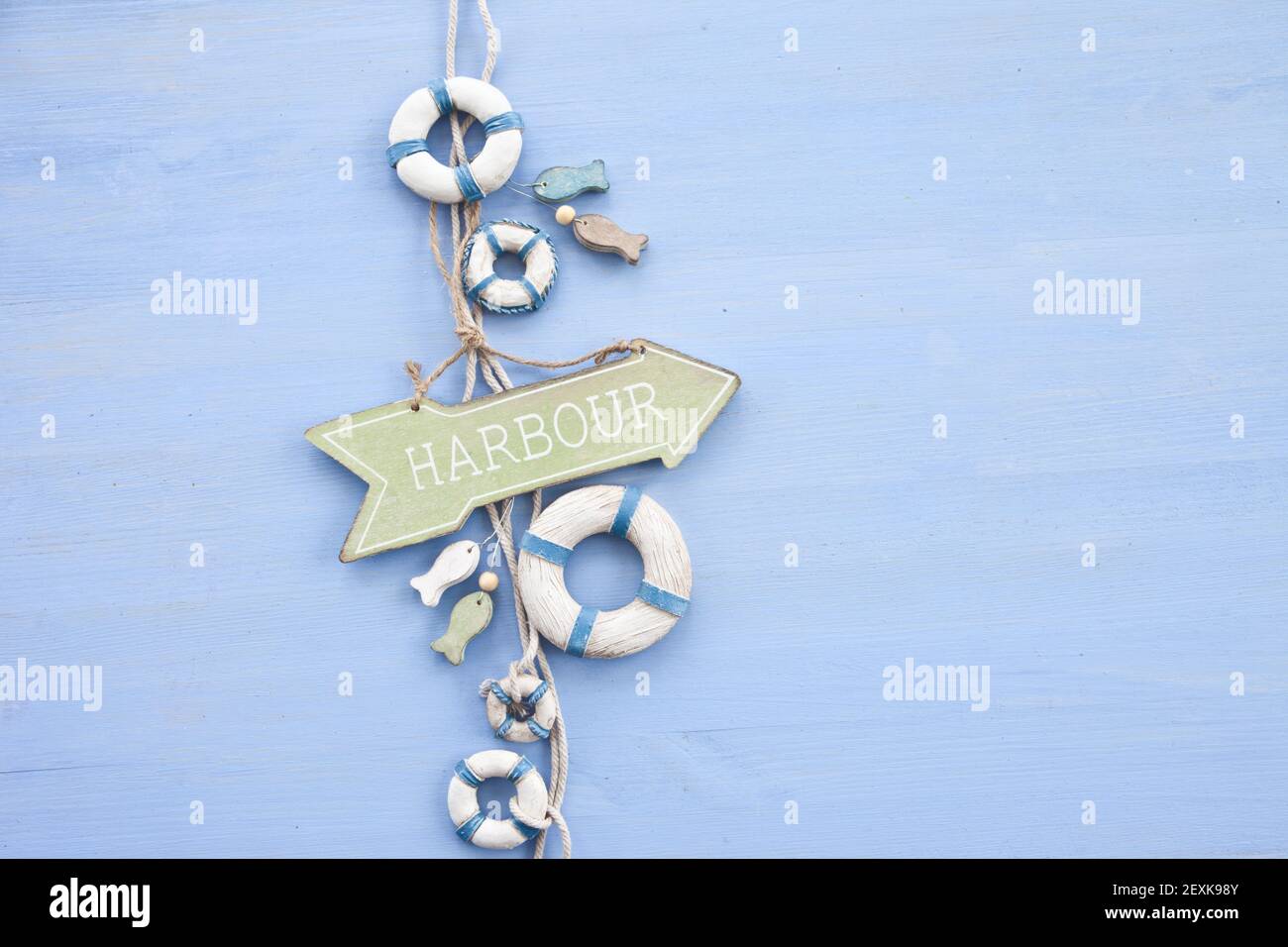 Blue background with sign to the port Stock Photo - Alamy