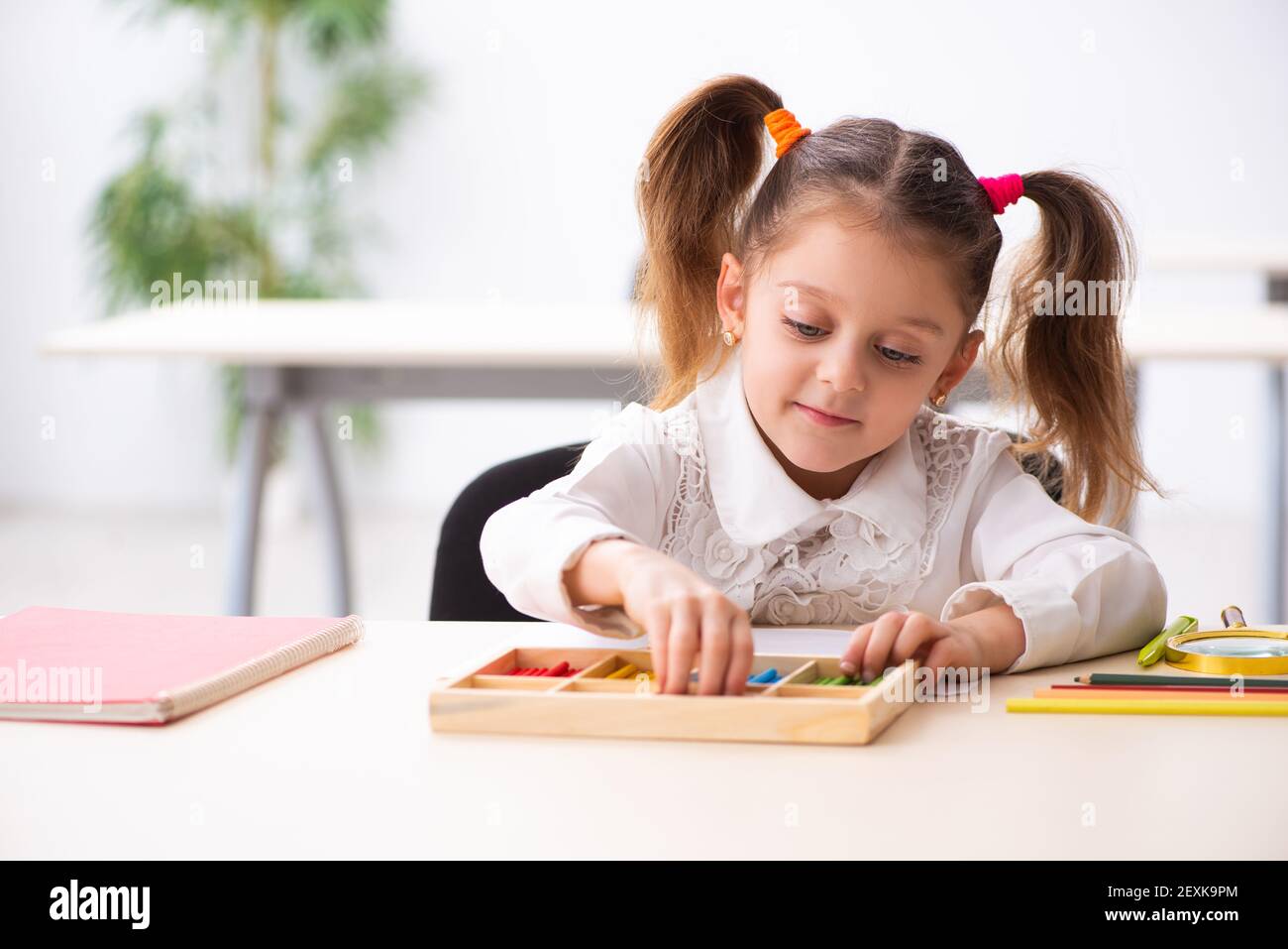 Small girl in the early development concept Stock Photo - Alamy