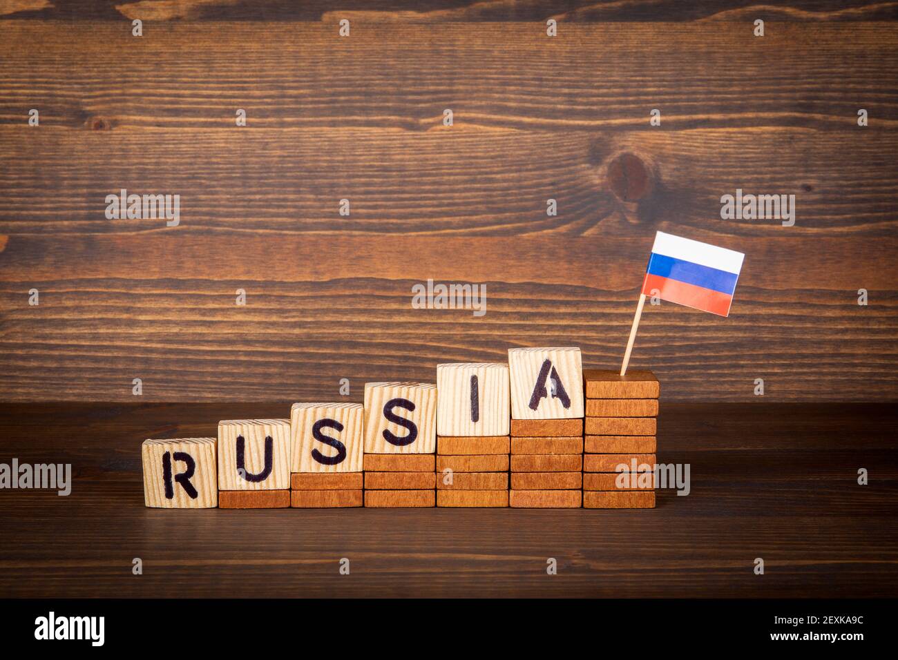 RUSSIA. Politics, Development, Economics and Sanctions concept. Wooden ...