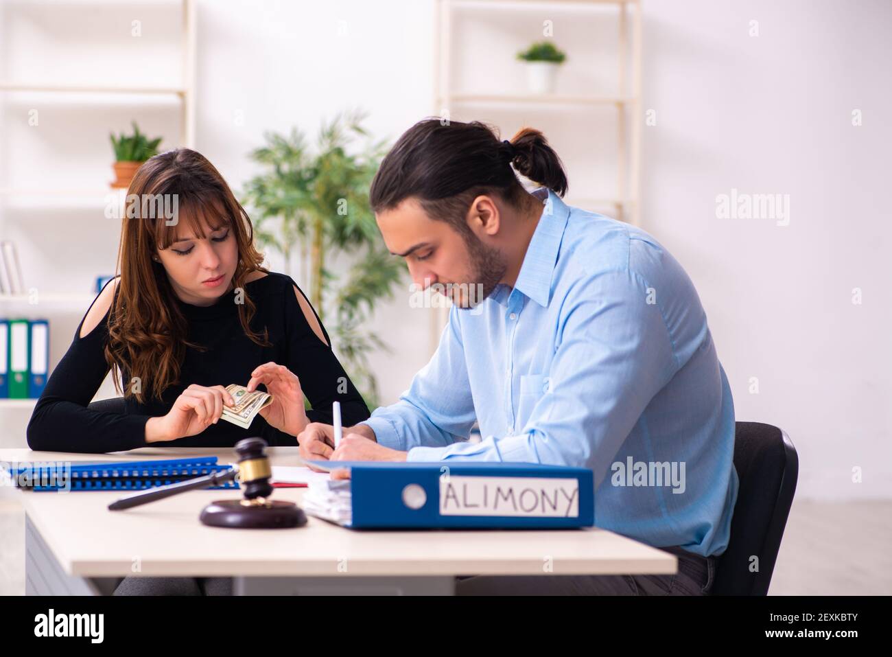 Couple divorcing in alimony concept Stock Photo - Alamy