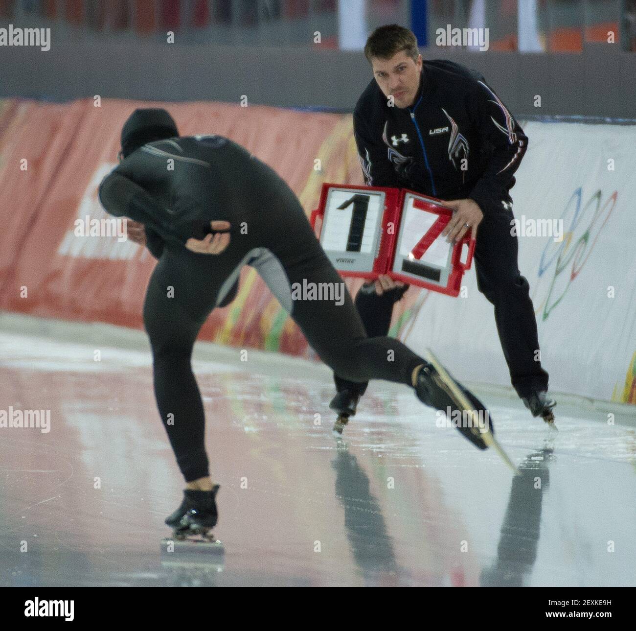 USA's Patrick Meek gets instructions from his coach as he competes ...