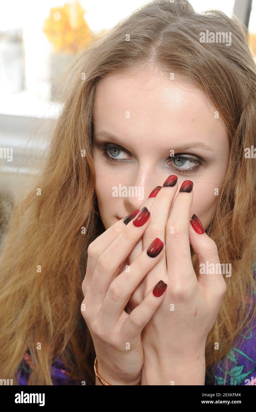 Model backstage during the Diego Binetti Fall 2014 Collection, held at ...