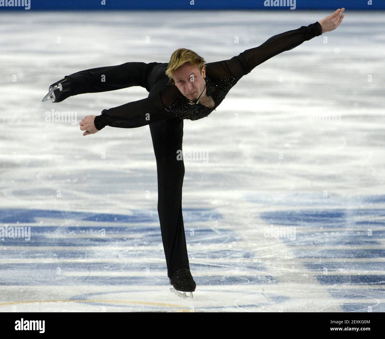 Russia's Evgeny Plyushchenko performs in the team men free skating during the Winter Olympics at ...