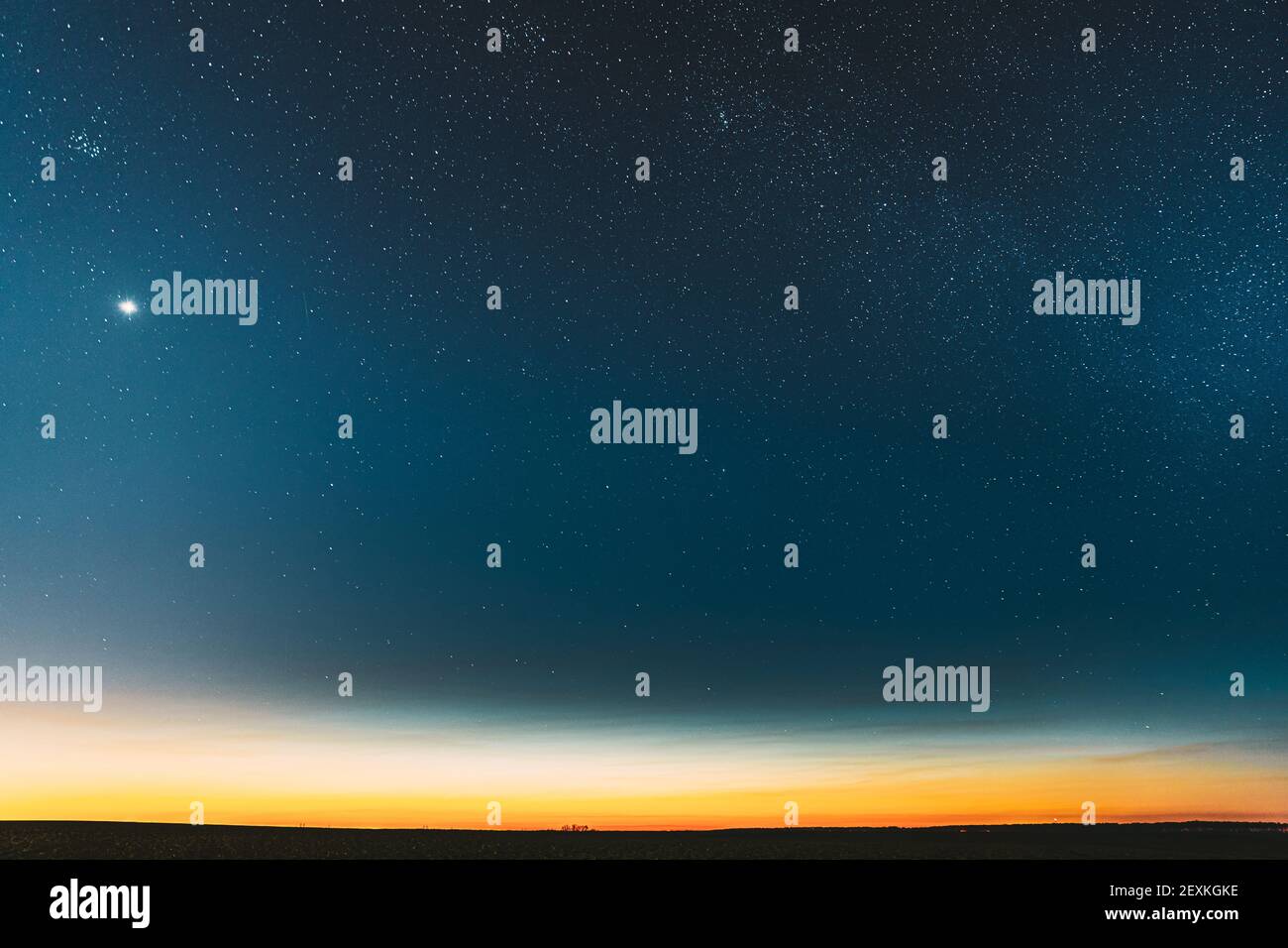 Night Starry Sky With Glowing Stars Above Countryside Field Landscape ...