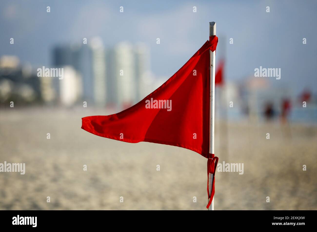 10 Feb 2014. Cancun, Mexico. Red surf flags warn of heavy surf ...