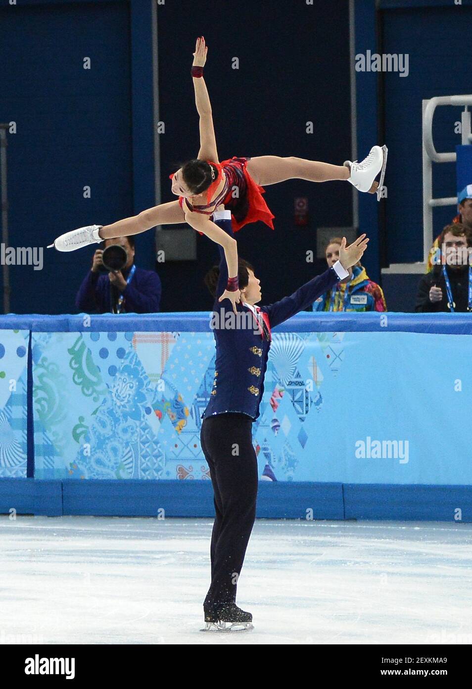 Pang Qing and Tong Hao of China compete in the pairs free skate during ...