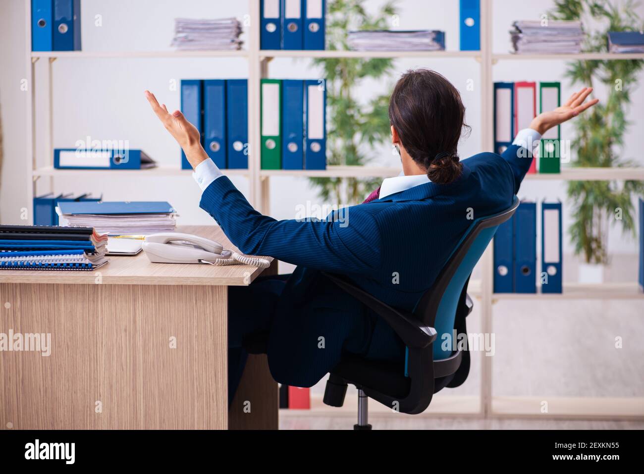 Back office worker pile of paper hi-res stock photography and images ...