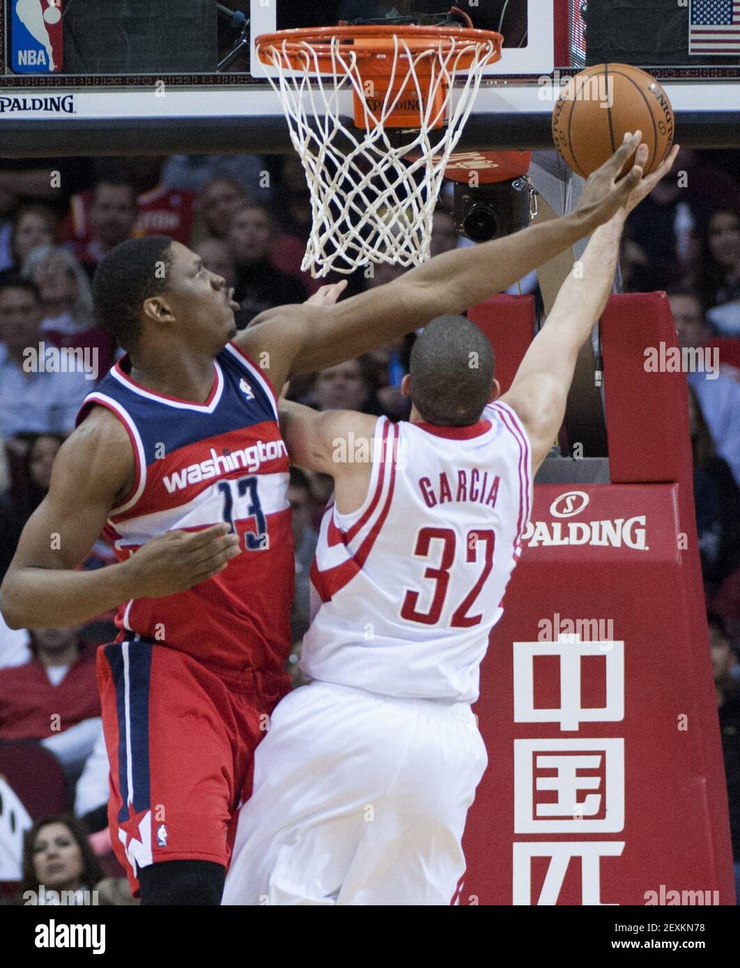 Francisco Garcia (32) of the Houston Rockets puts up a shot against ...