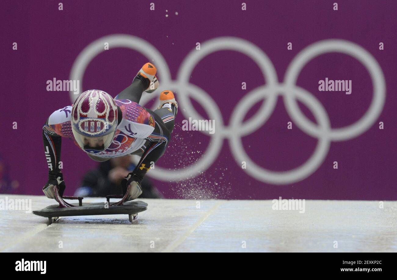 USA's Noelle Pikus-Pace jumps on her sled for her second qualifying run ...