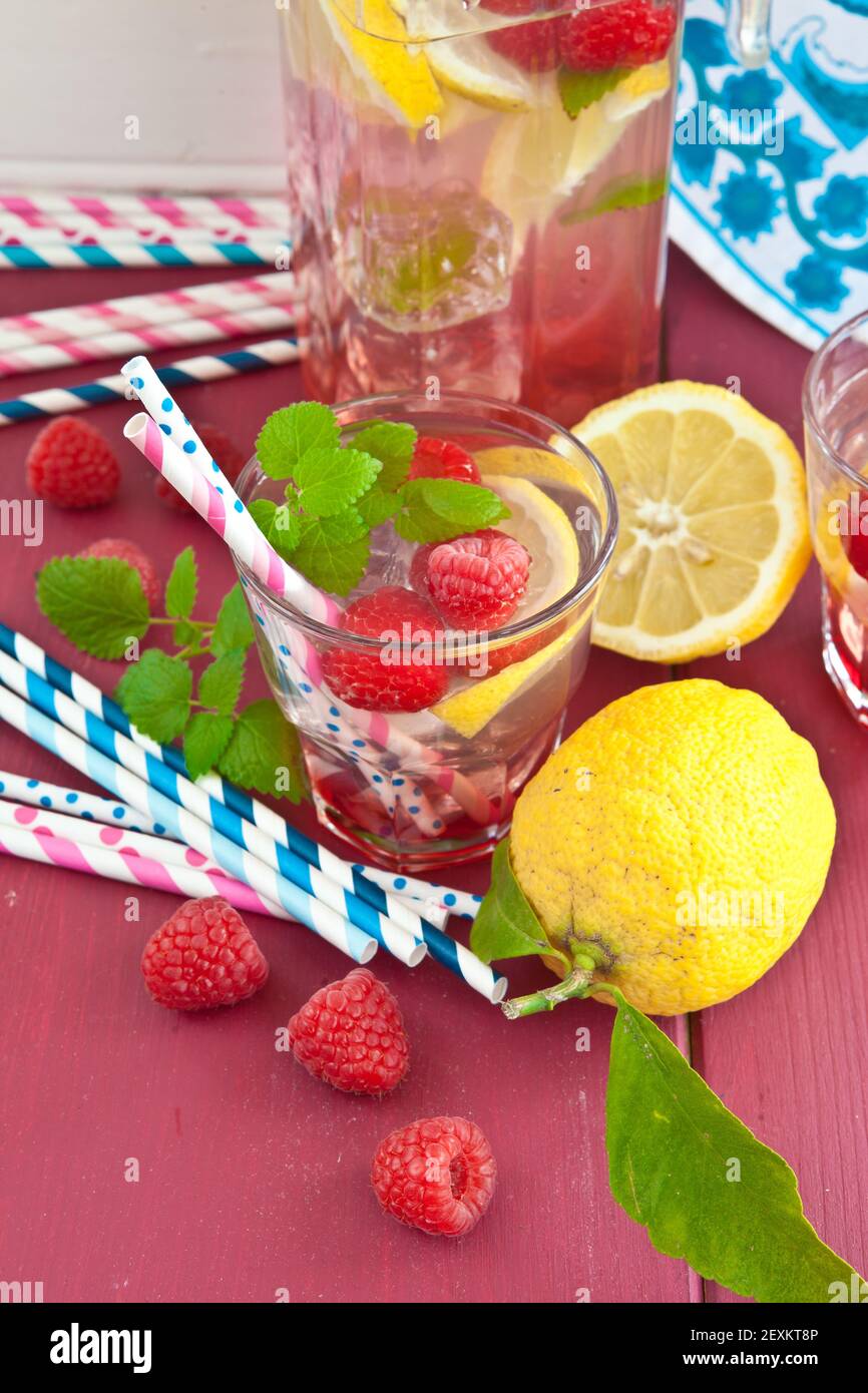 Homemade lemonade with raspberries Stock Photo - Alamy